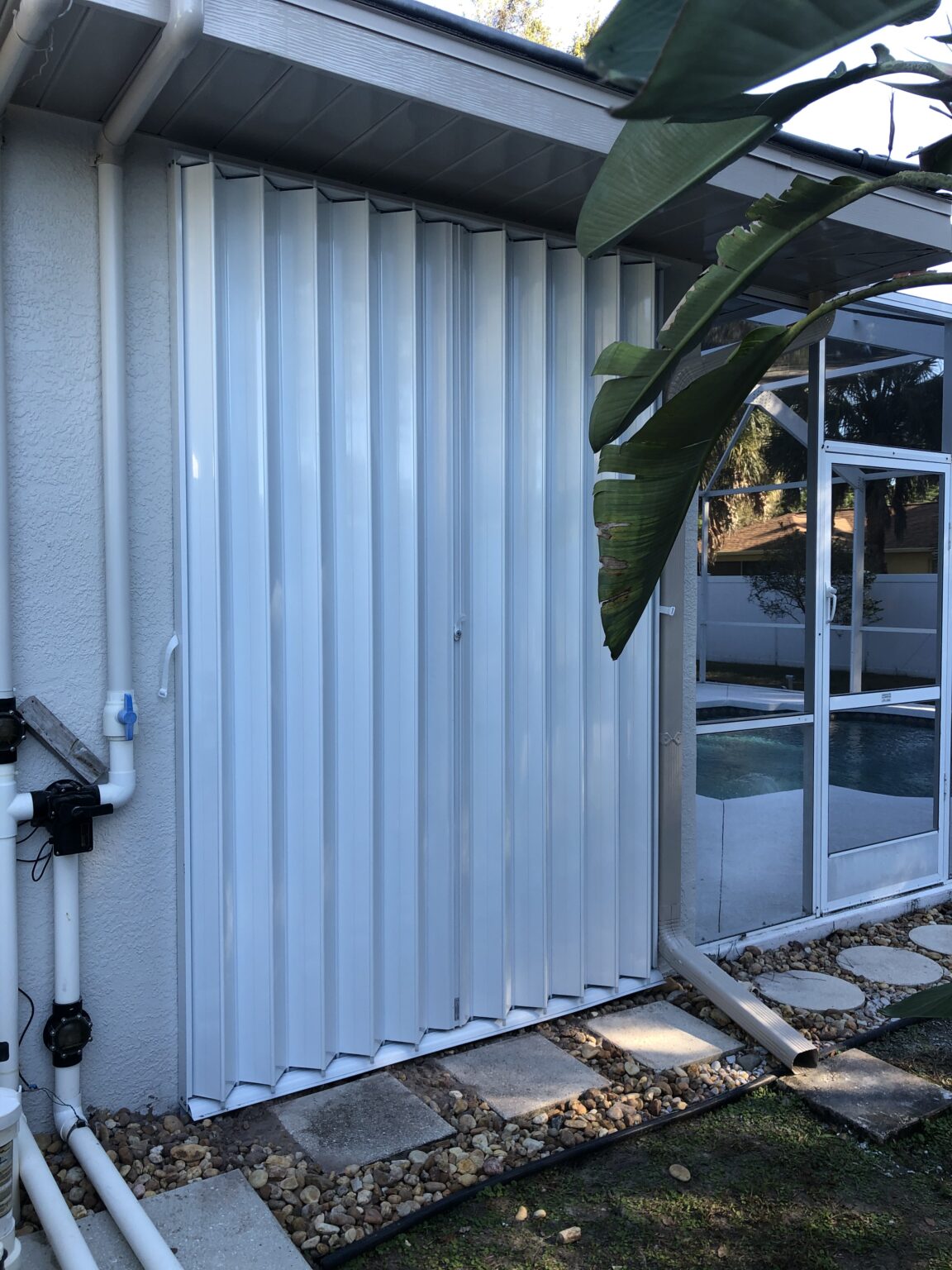 Accordion Shutters - Tropic Storm Protection Inc.